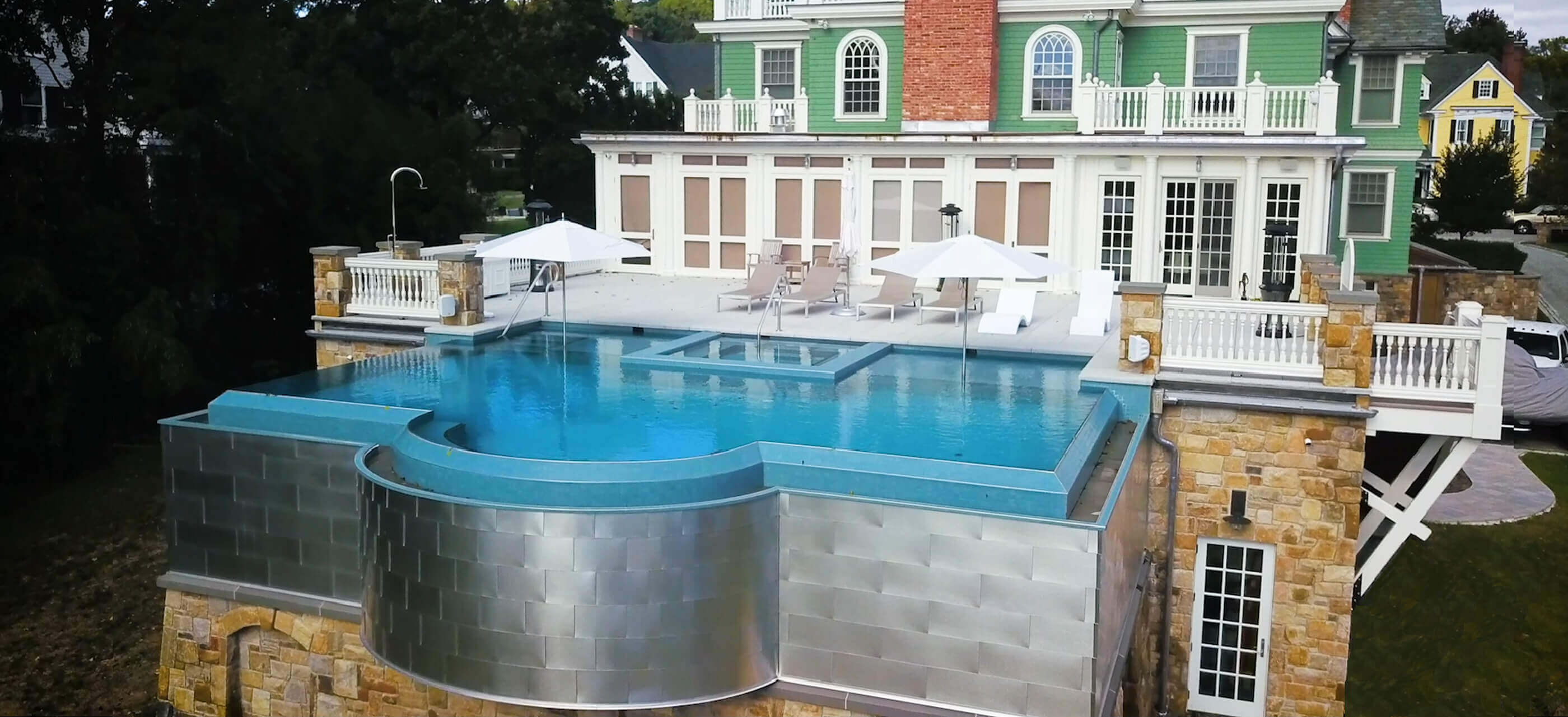 Rooftop Pool with Vanishing Edge | 4 Season Spa | Cross River Design